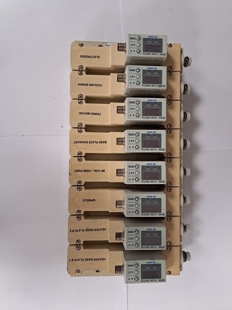 SMC FLOW SWITCH, 5-40L/MIN PNP 12-24VDC. MOUNTED ON A 4WAY MANIFOLD TO ...